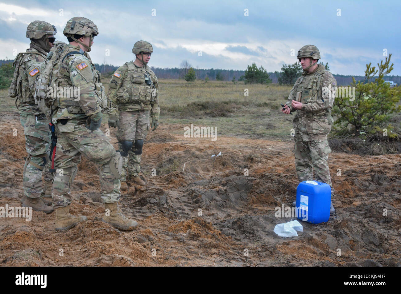 Lt. Col. Scott Cheney, the Battle Group Poland commander, receives a ...