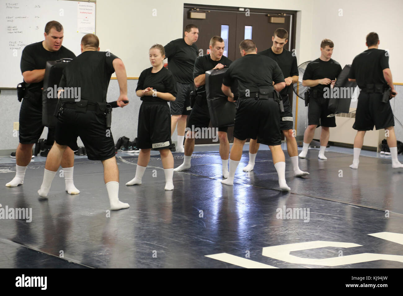 Cadets with the Wisconsin State Patrol Academy practice self-defense ...