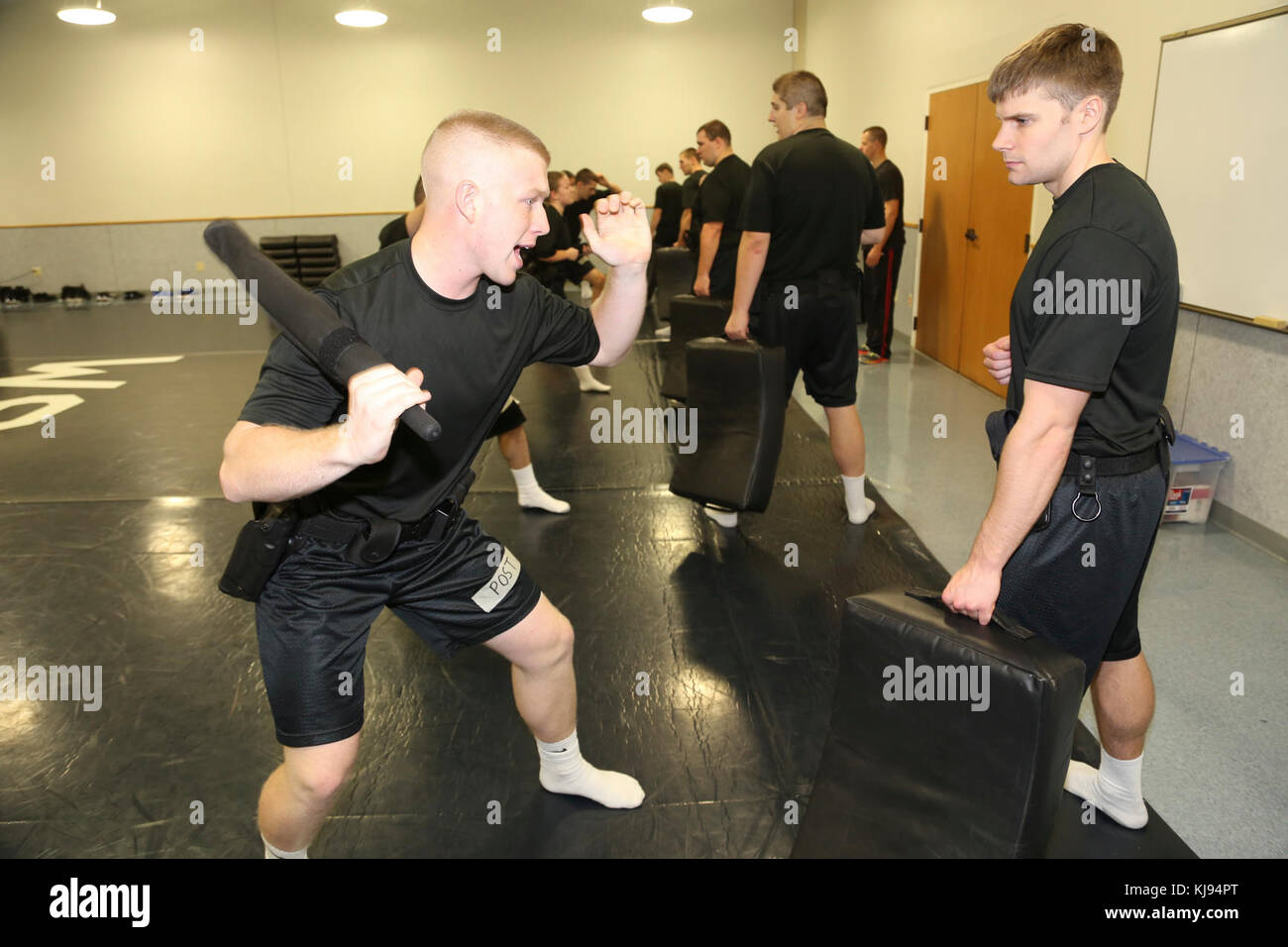 Cadets with the Wisconsin State Patrol Academy practice self-defense ...