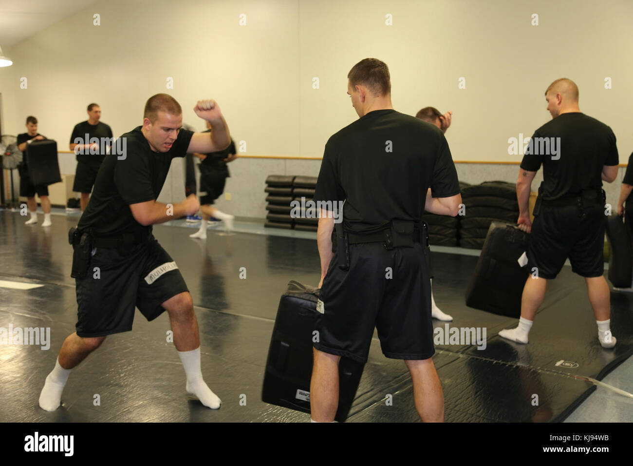Cadets with the Wisconsin State Patrol Academy practice self-defense ...