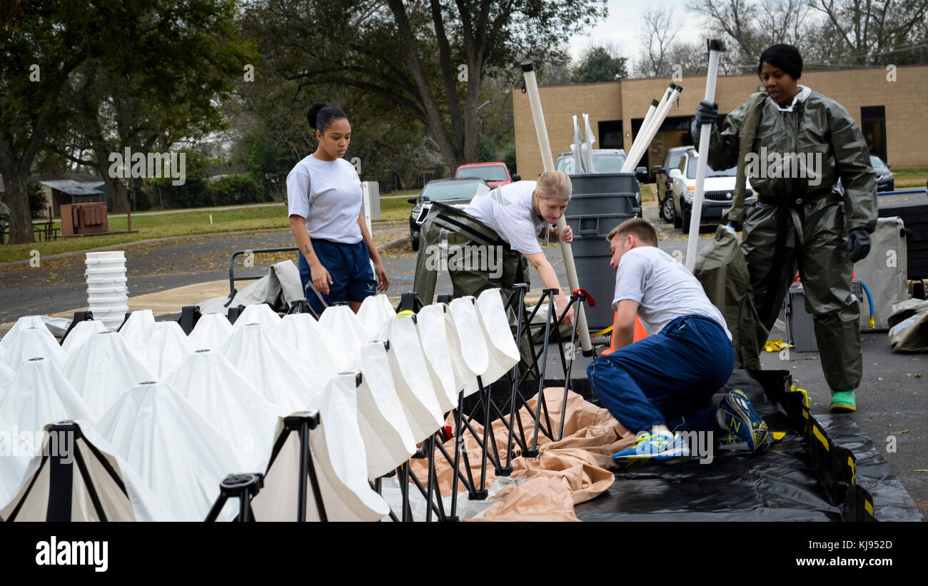 2nd Medical Group decontamination team members set up a decontamination ...