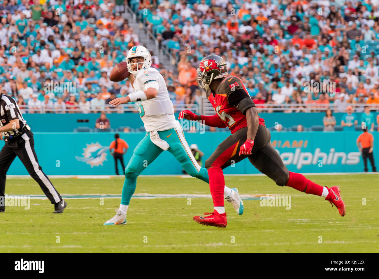 Miami Gardens FL, USA. 19th Nov, 2017. Matt Moore #8 of Miami scrambles ...