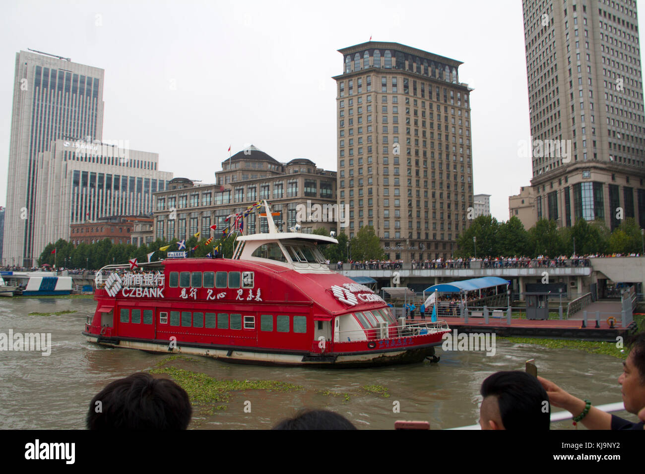 A boat travels on the Huangpu River in Shanghai, China Stock Photo - Alamy