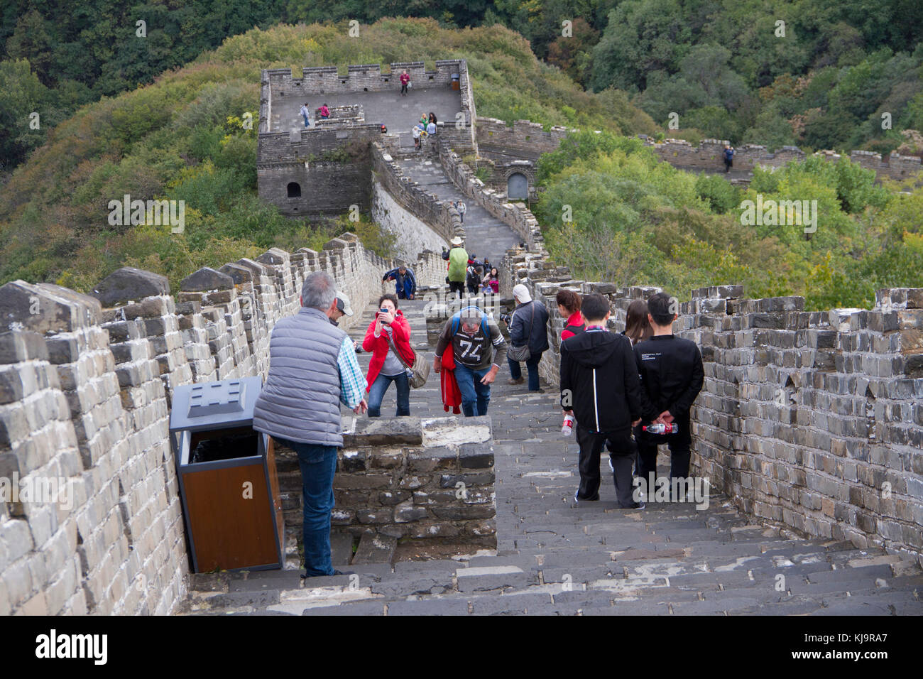 People walk on the Mutianyu section of the Great Wall of China in ...