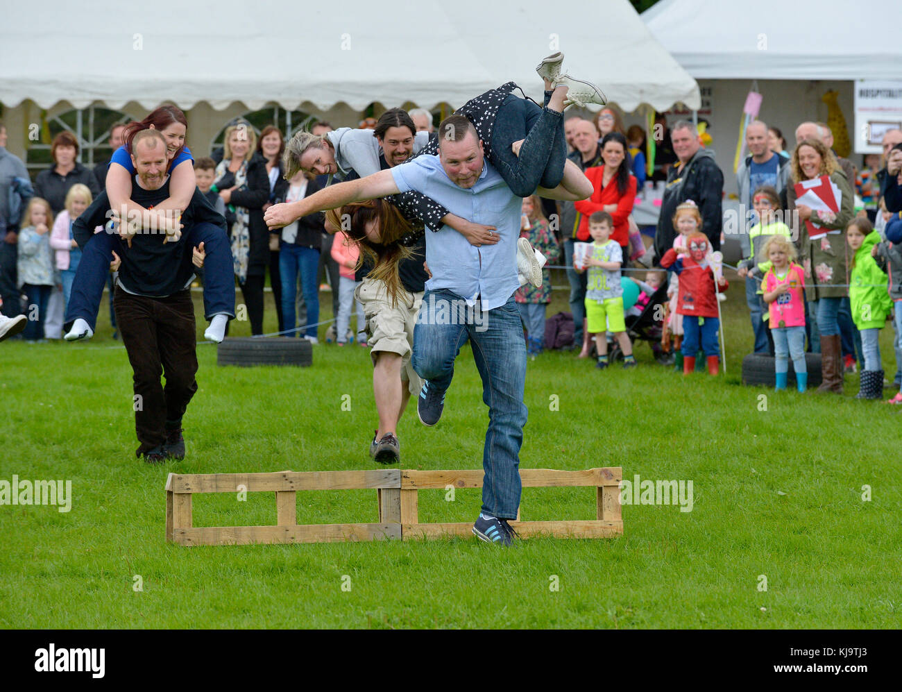 Wife carrying competition at annual Muff Festival, County Donegal, Republic of Ireland. ©George ...