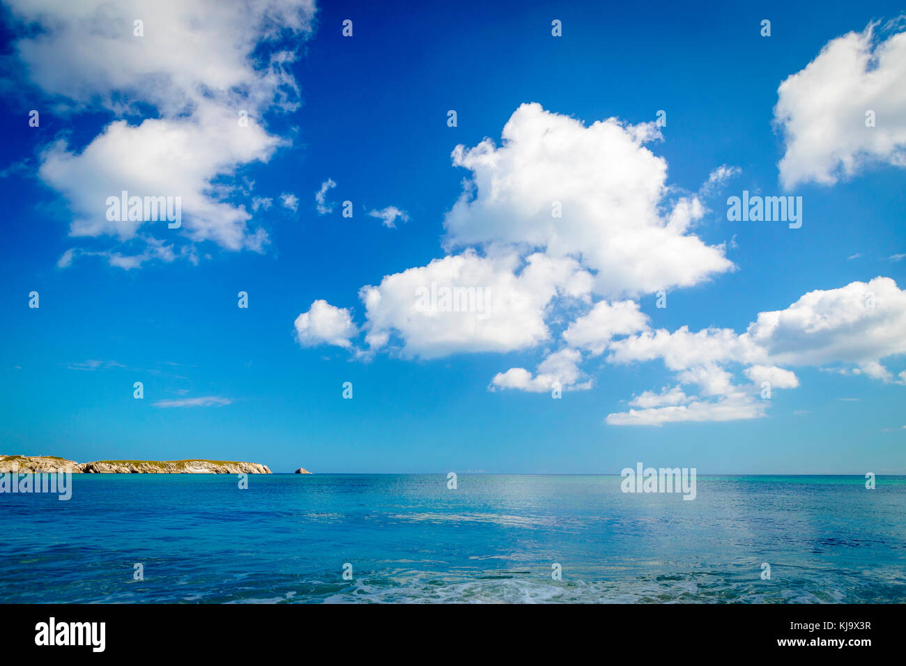 Blue sky and ocean beach in Portugal Stock Photo - Alamy