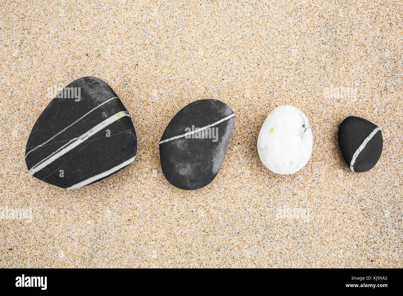 Top view of sea stones over the sand Stock Photo - Alamy