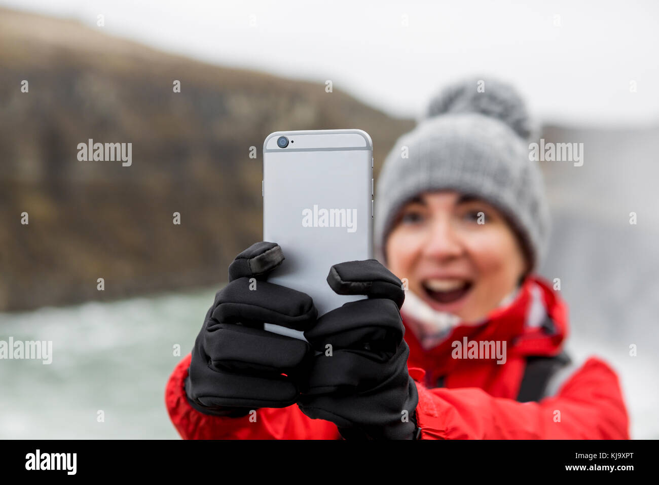 Female tourist having fun and making a selfie Stock Photo - Alamy