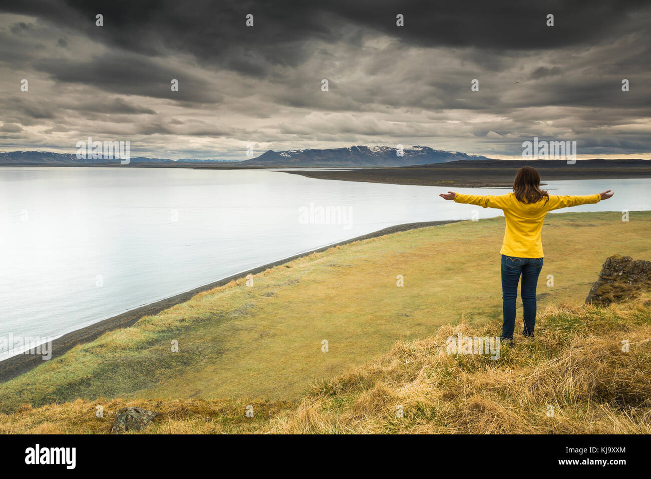 Woman contemplating a beautiful landscape Stock Photo - Alamy