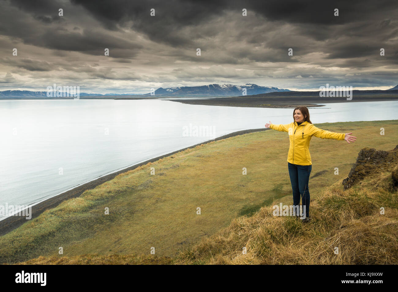 Woman contemplating a beautiful landscape Stock Photo - Alamy
