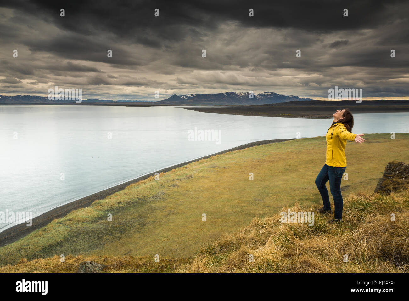 Woman contemplating a beautiful landscape Stock Photo - Alamy