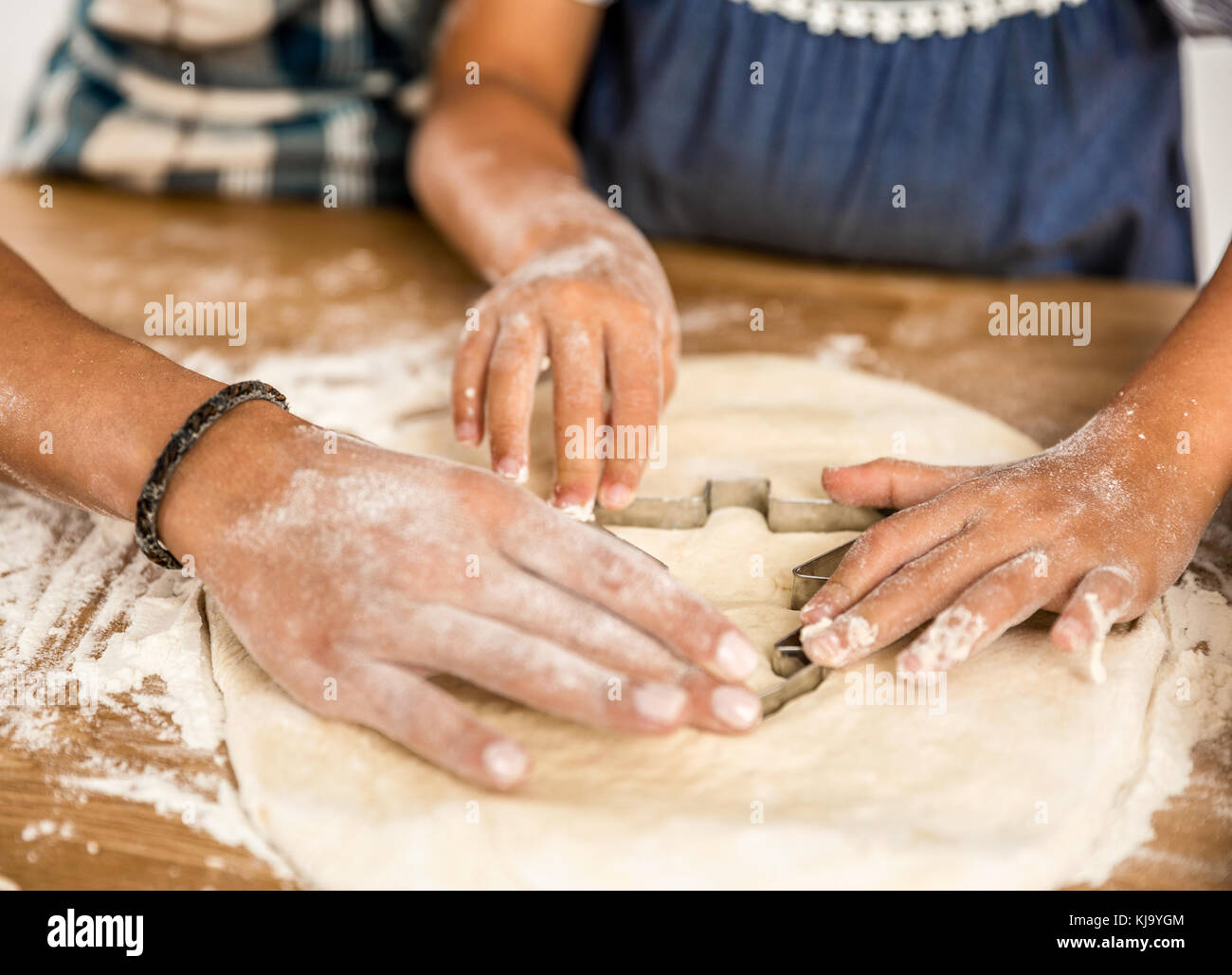 Close-up shot of hands on the paste learning to bake Stock Photo - Alamy