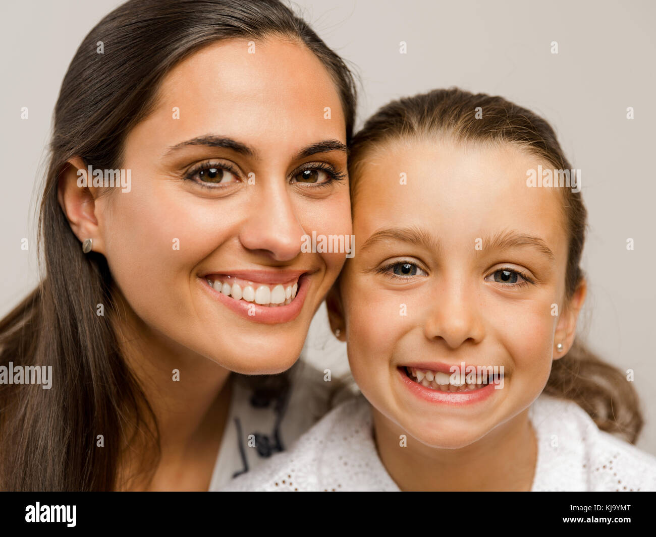 Shot of a beautiful Mother and Daughter smiling Stock Photo - Alamy