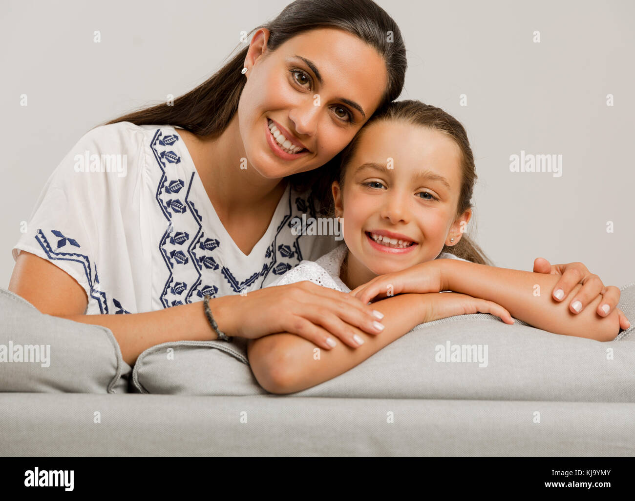 Beautiful Mom and Daughter having fun at home Stock Photo - Alamy