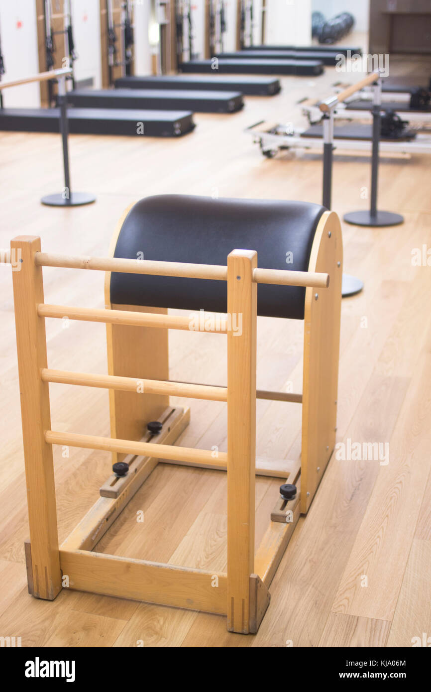 Barrel pilates studio machine for fitness workouts in gym Stock Photo ...