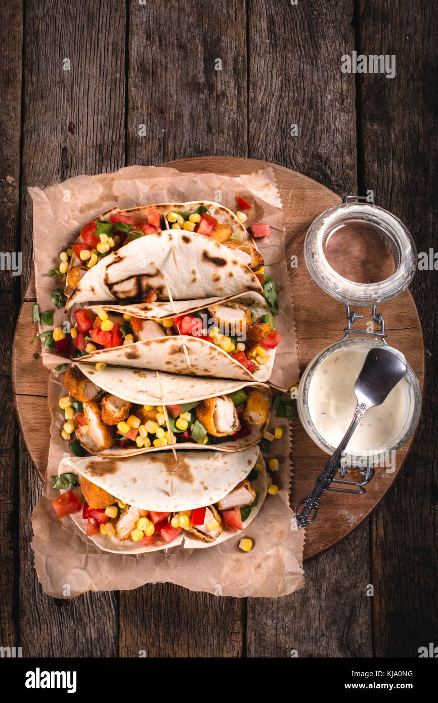 Tortilla wrap sandwiches with fried chicken and vegetables from above ...