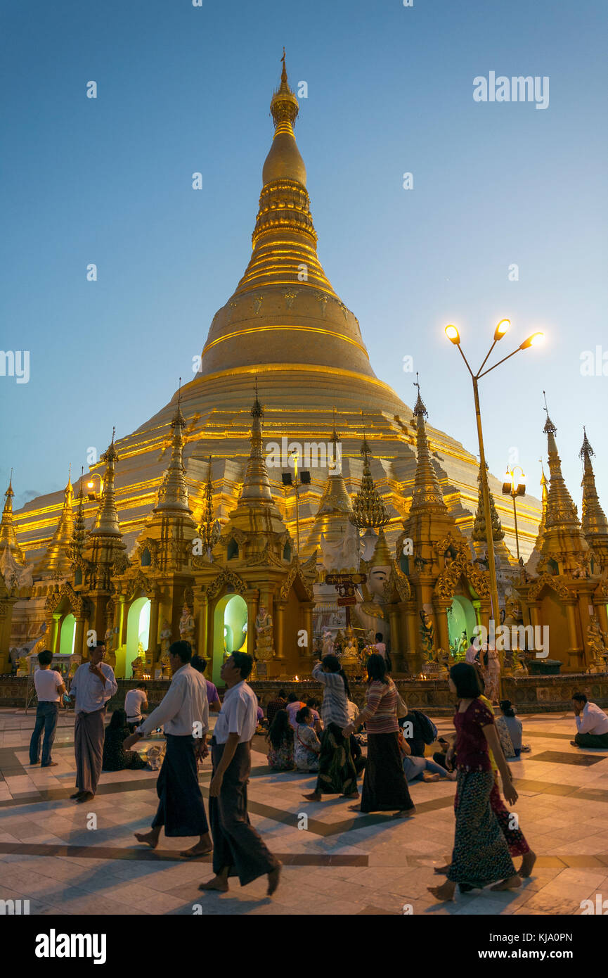 Myanmar (formerly Burma). Yangon. (Rangoon). People at Shwedagon Pagoda ...