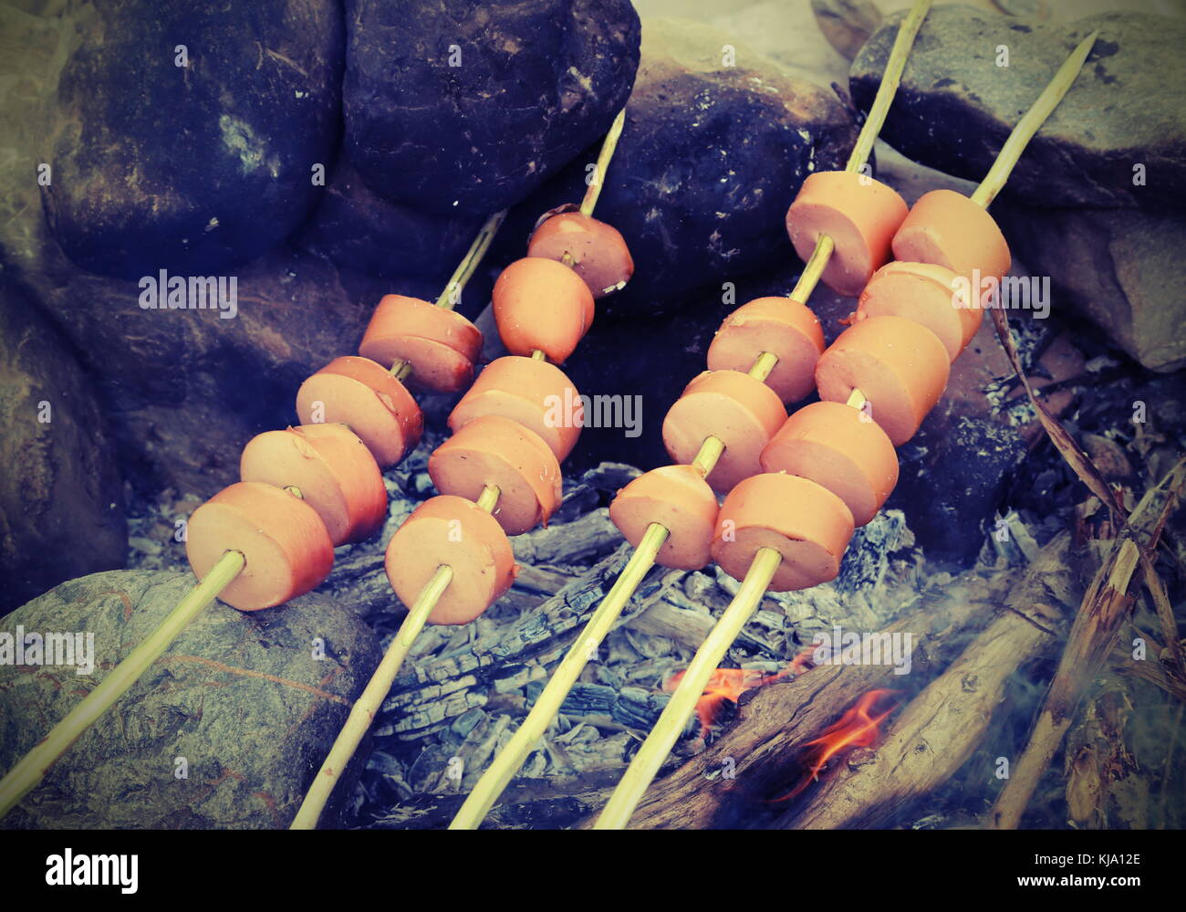 bonfire created with the stones to cook wurstel during the boy scout ...