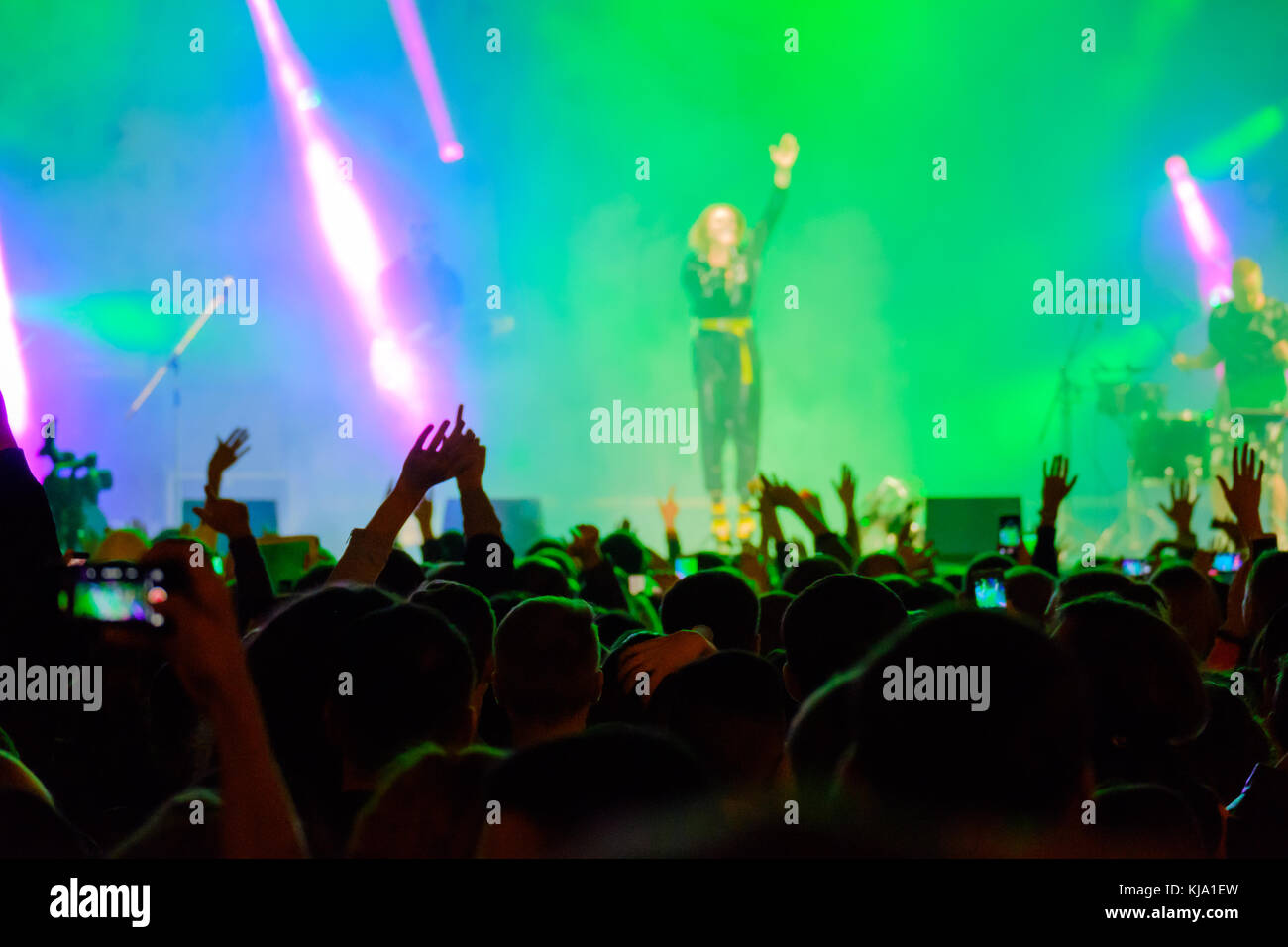 Group performing at live concert Stock Photo - Alamy