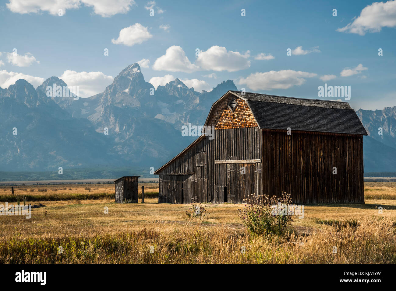 Abandoned farm buildings at Mormon Row on Antelope Flats overlooking ...