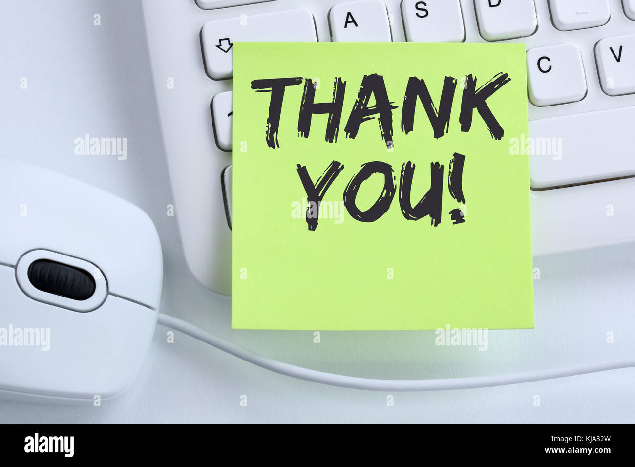 Thank you on notepaper office business concept mouse computer keyboard ...