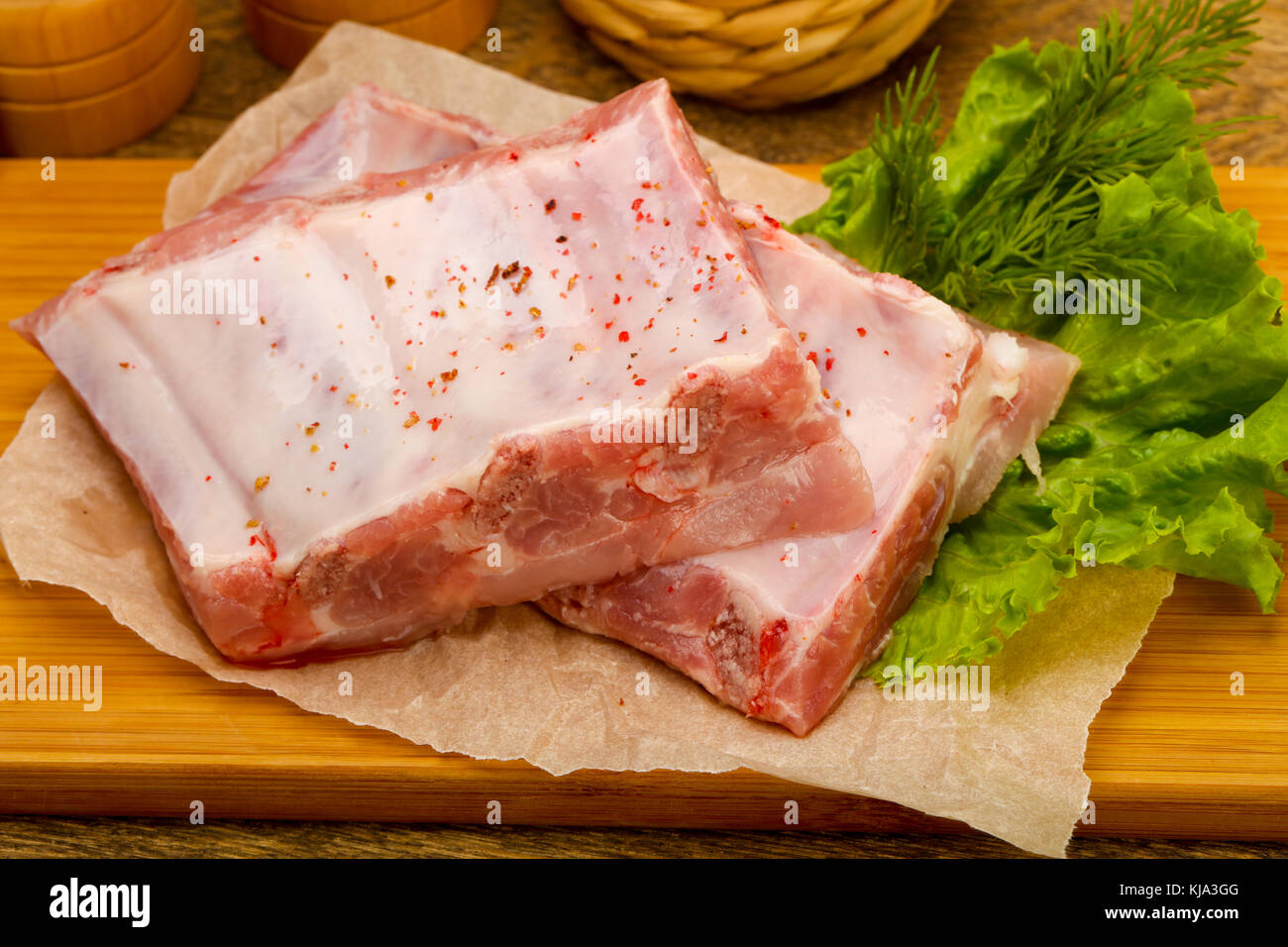 Raw pork ribs ready for cooking. With spices Stock Photo - Alamy