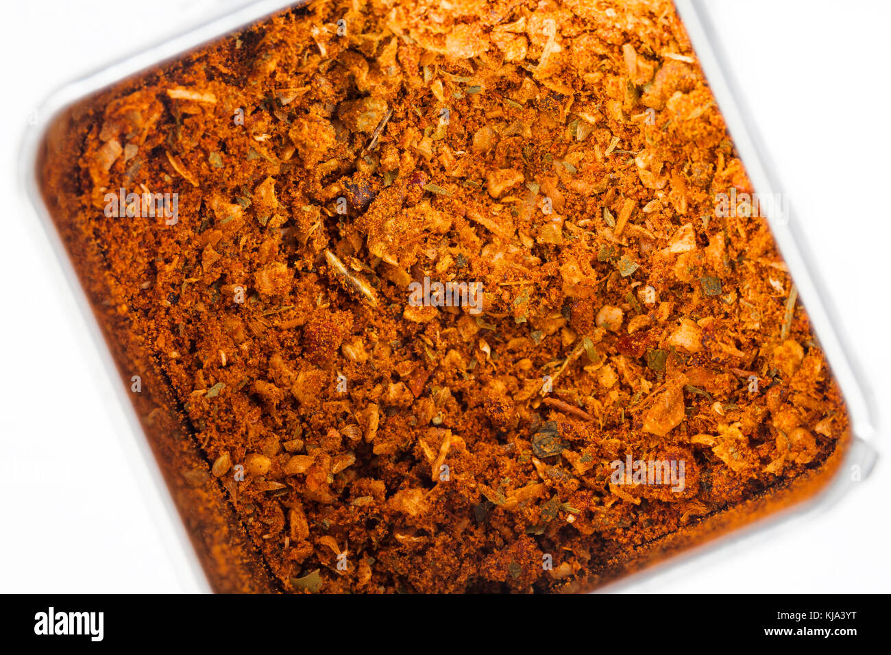 Picadillo spice mixture in a metal can seen from above Stock Photo - Alamy