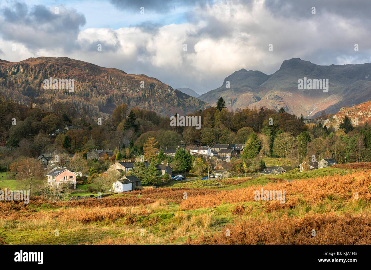 View over Elterwater Village towards the Langdale Pikes, Lake District ...