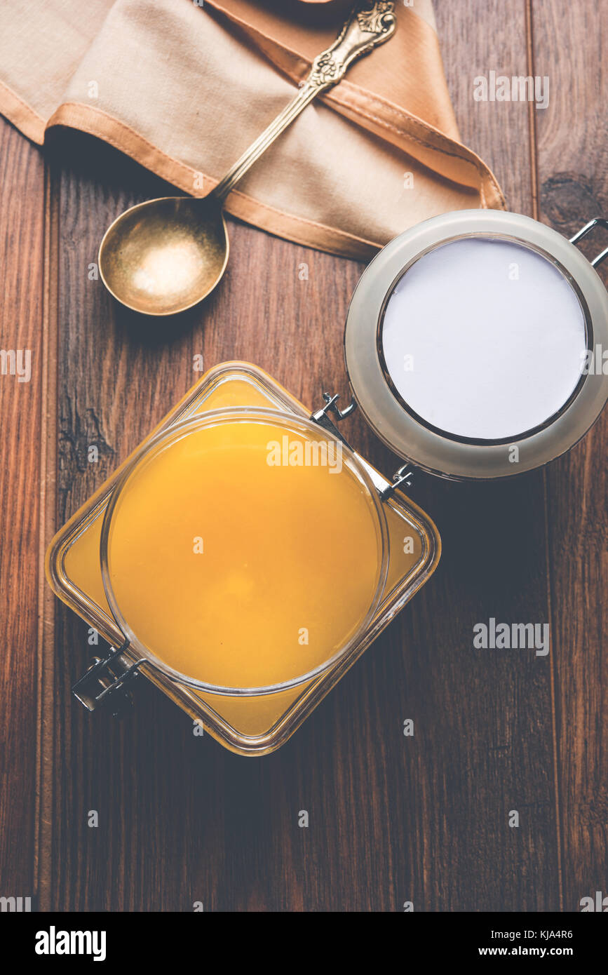 Desi Ghee or clarified butter in glass or Copper container or ceramic ...