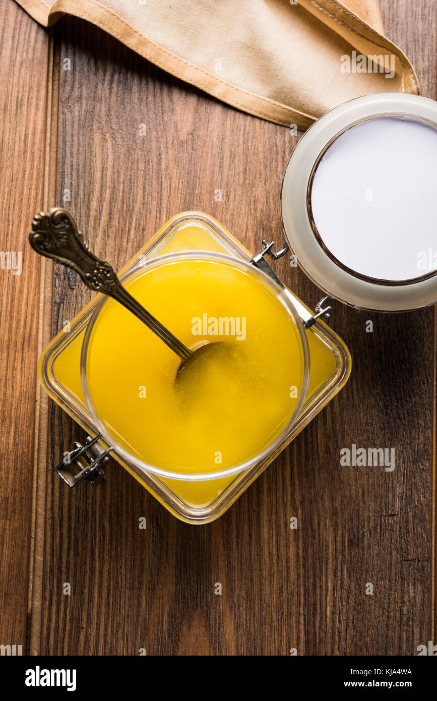 Desi Ghee or clarified butter in glass or Copper container or ceramic ...