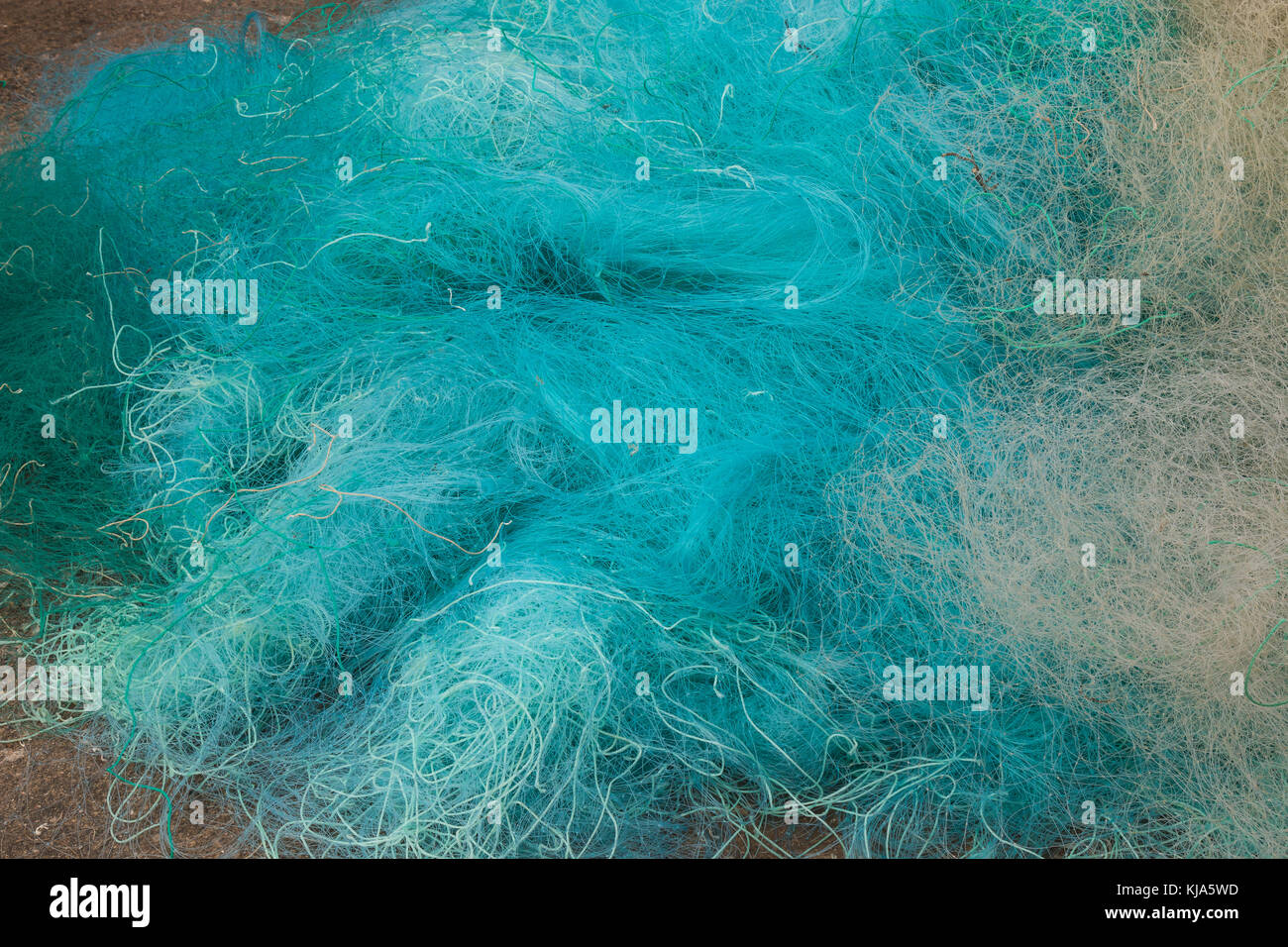 Green fishing net with a fine texture Stock Photo - Alamy