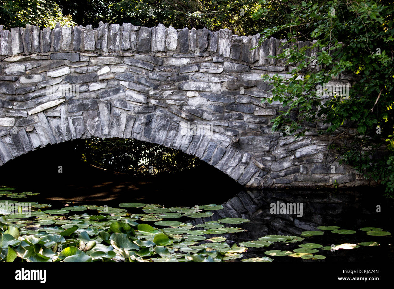 Stone bridge over rushing water hi-res stock photography and images - Alamy