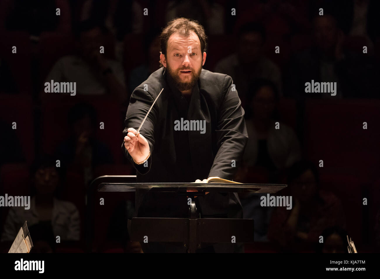 Latvian conductor Andris Nelsons performs at a concert in Shenzhen ...