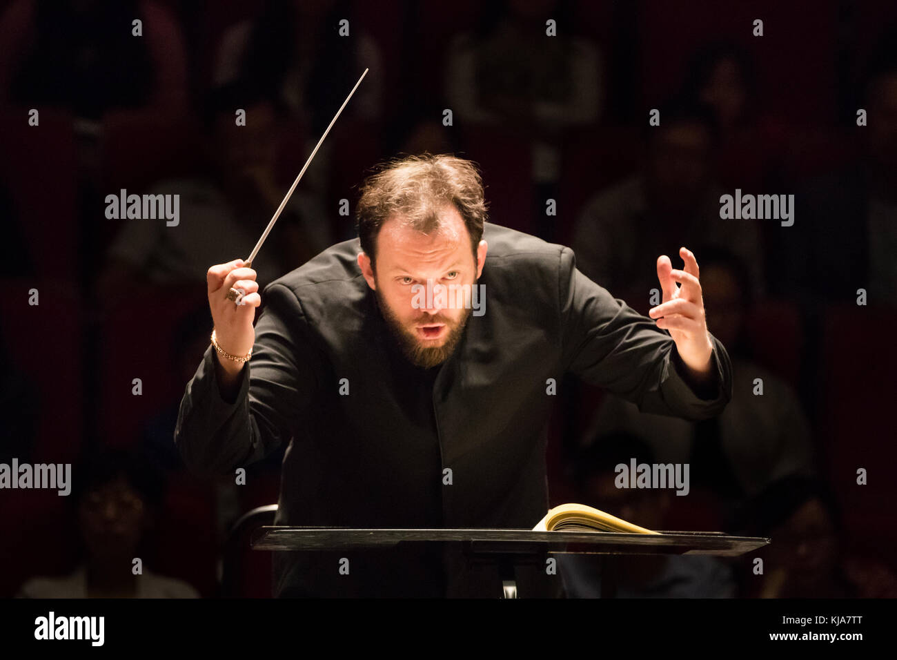 Latvian conductor Andris Nelsons performs at a concert in Shenzhen ...