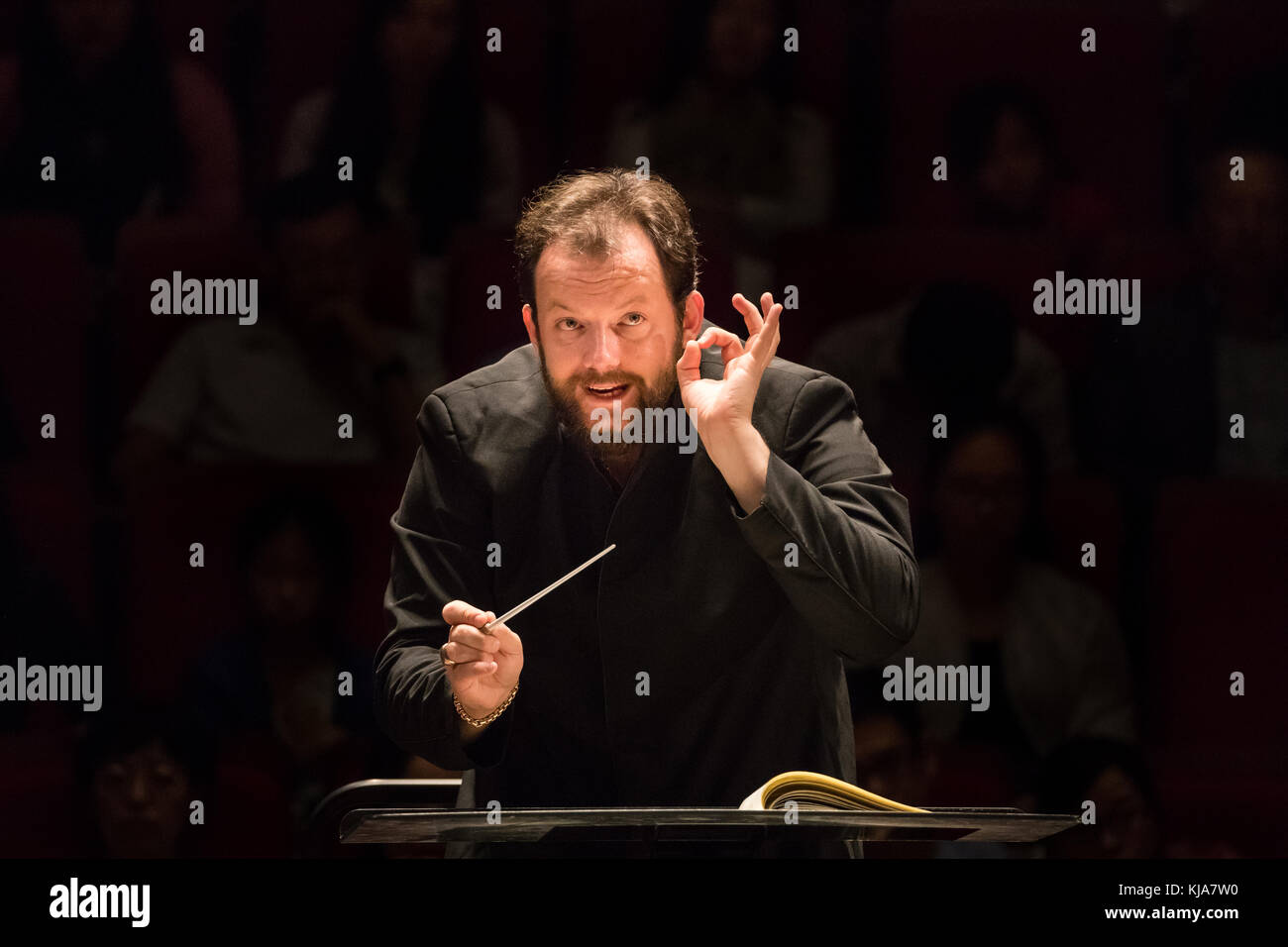 Latvian conductor Andris Nelsons performs at a concert in Shenzhen ...