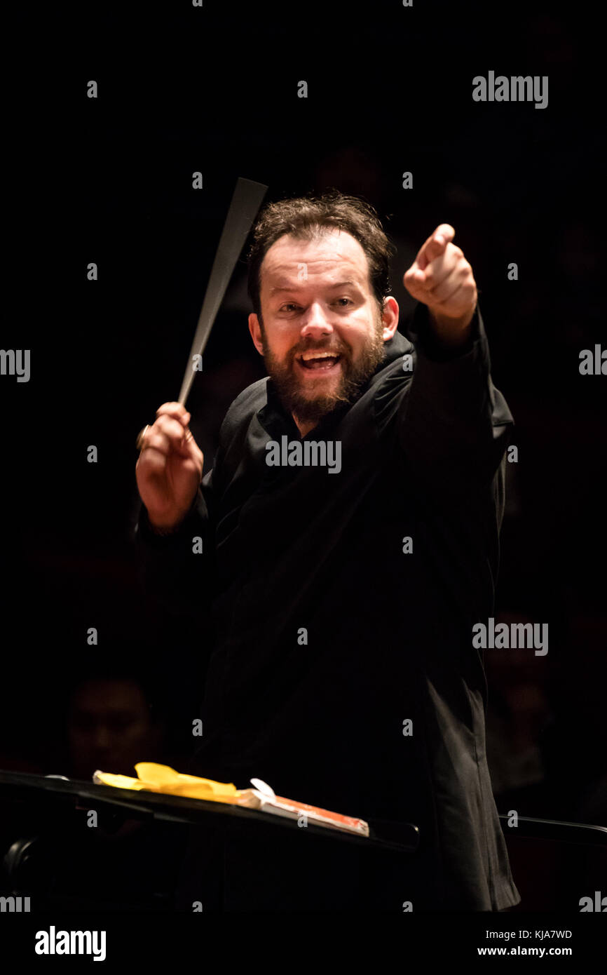 Latvian conductor Andris Nelsons performs at a concert in Shenzhen ...