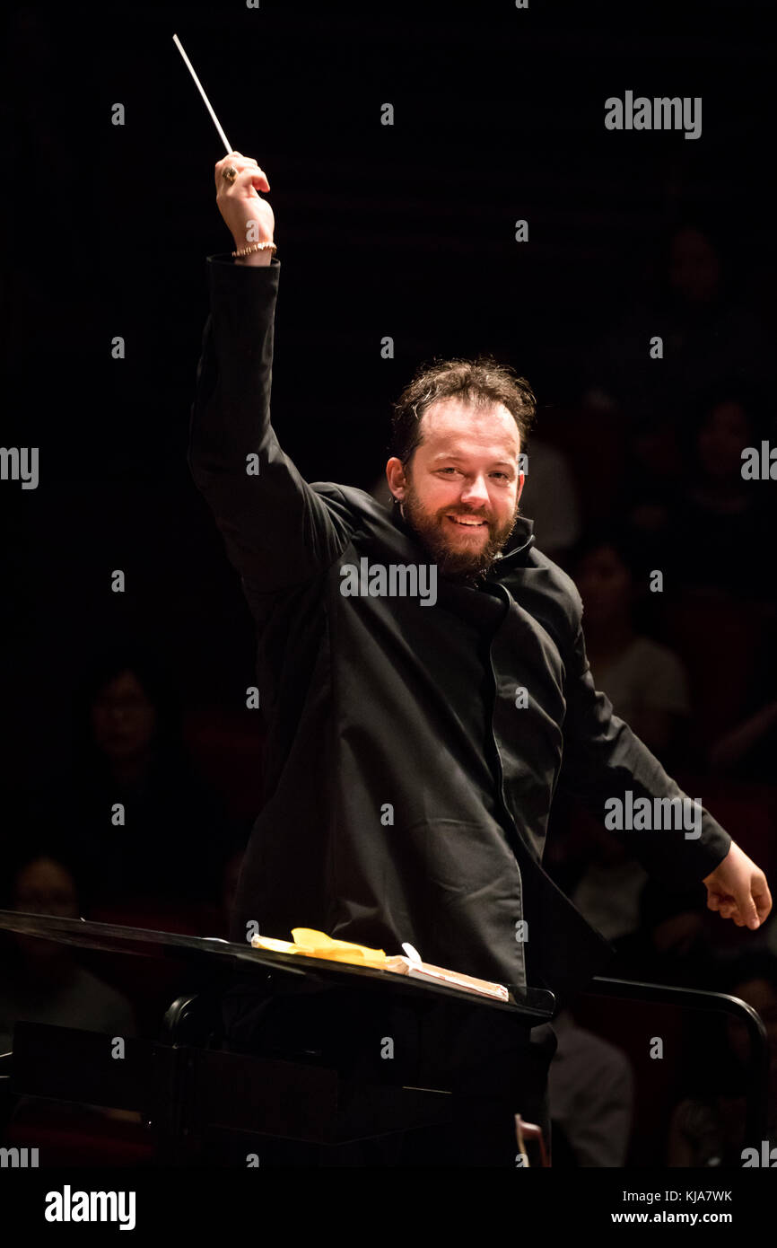 Latvian conductor Andris Nelsons performs at a concert in Shenzhen ...