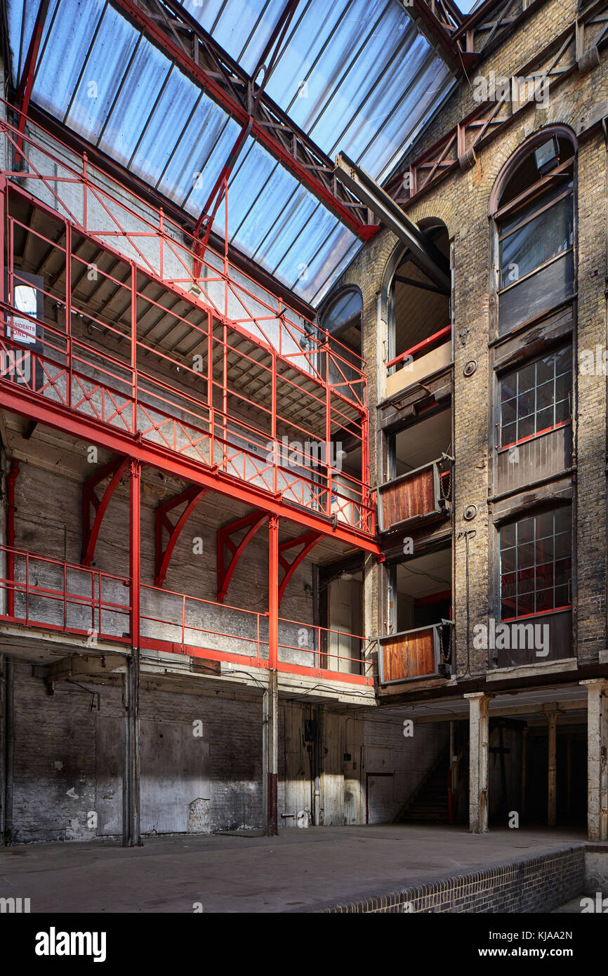 Full-height atrium with skylight and original features. The Farmiloe ...