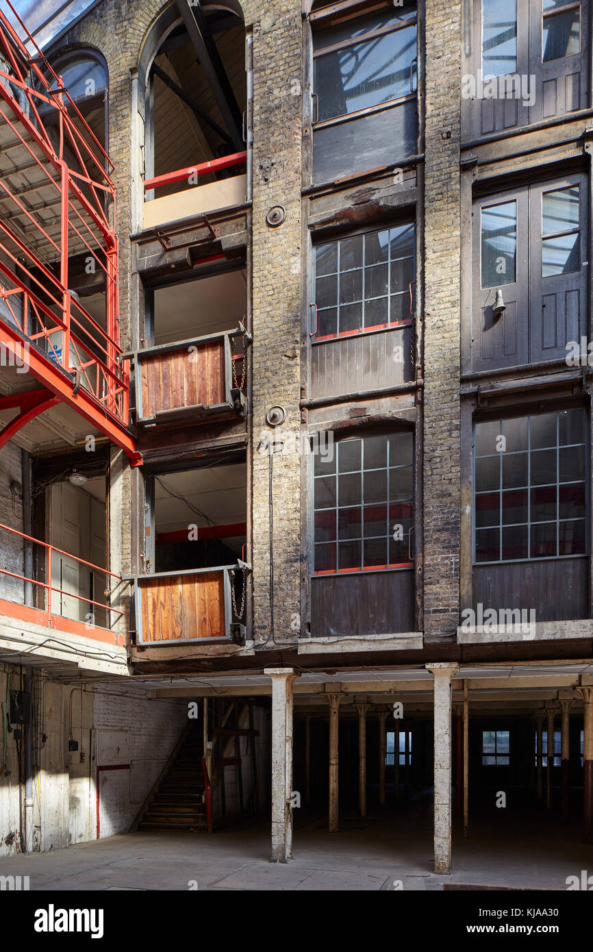 Full-height atrium with skylight and original features. The Farmiloe ...