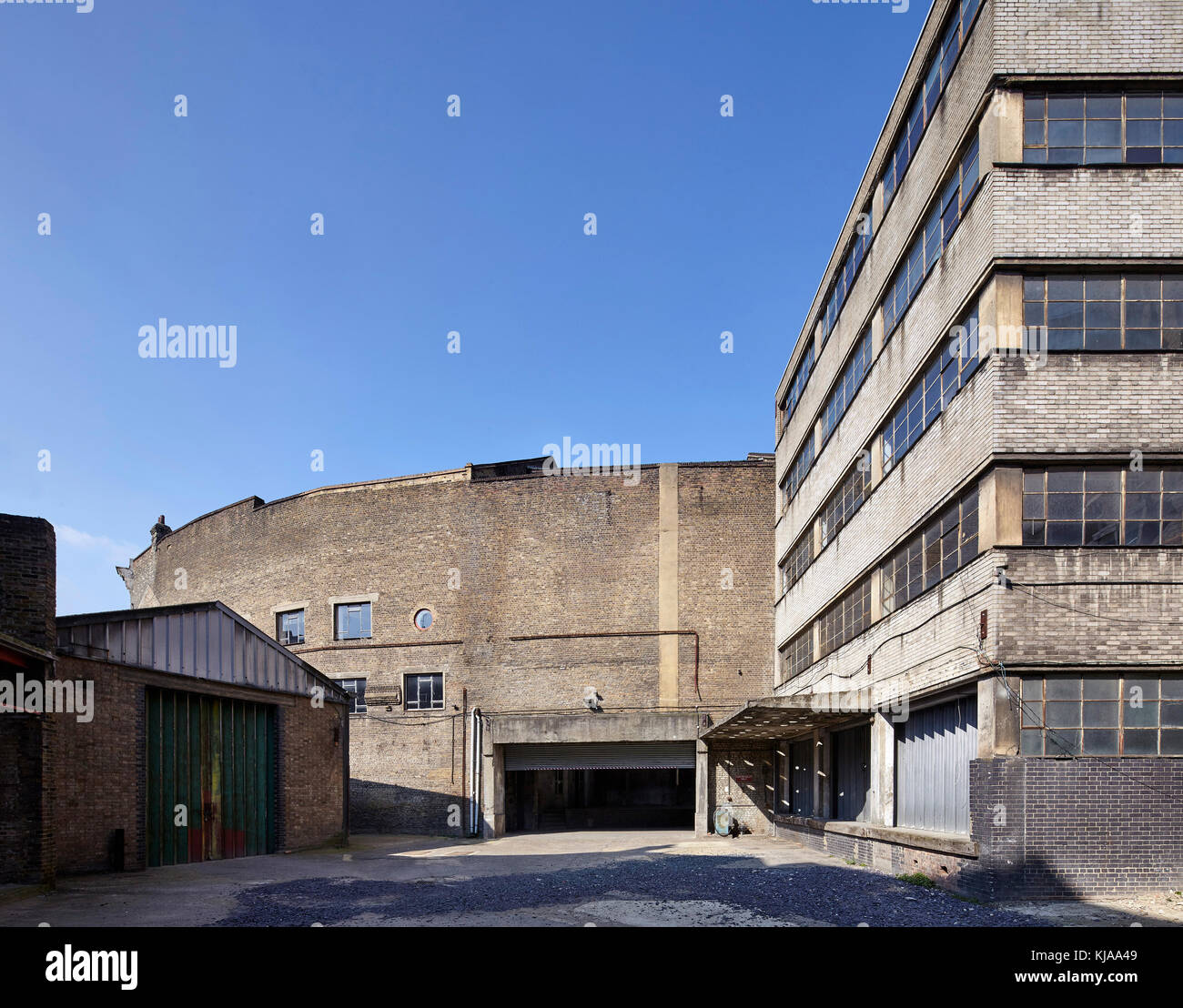 Elevation of rear facade in industrial yard. The Farmiloe Building ...