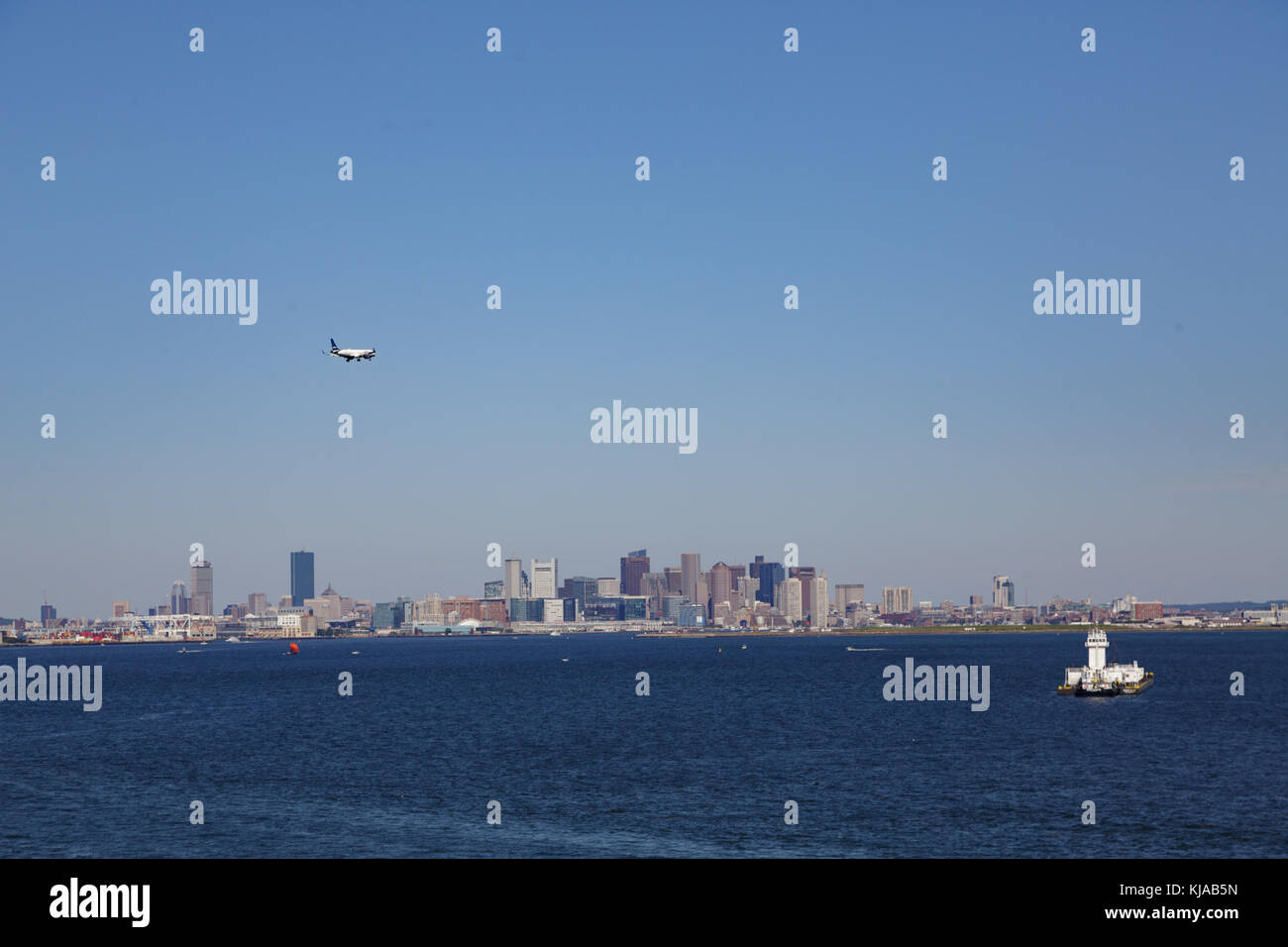Commercial Plane Over the Skyline of Boston Stock Photo - Alamy
