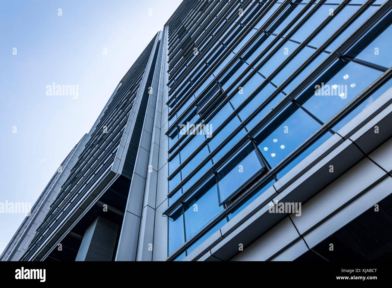 Bottom view of office building window close up Stock Photo - Alamy