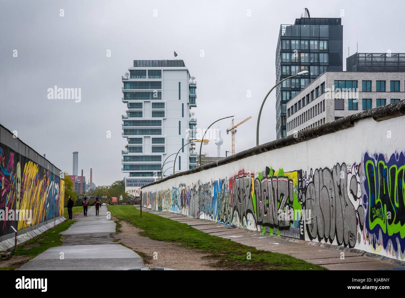 Remains of Berlin Wall with modern developments, eastern Berlin Stock ...