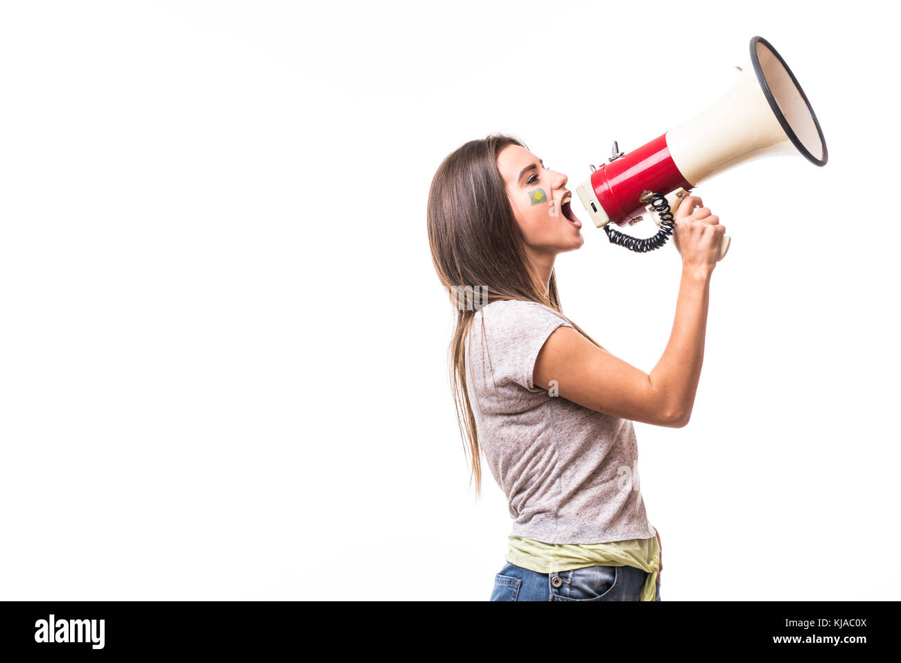 Scream on megaphone Brazil football fan in game supporting of Brazil ...