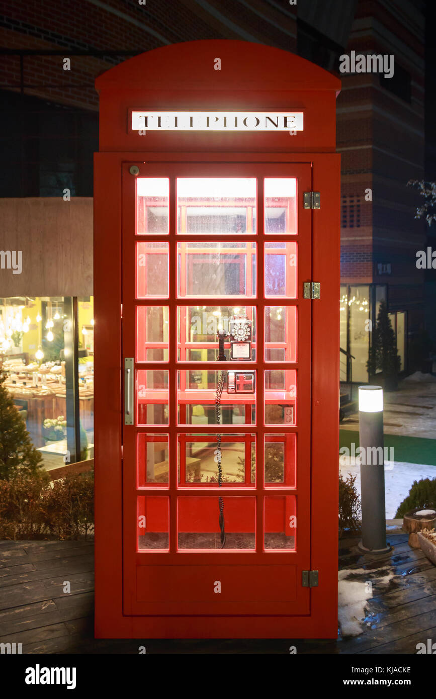Red Telephone Booth at night Stock Photo - Alamy