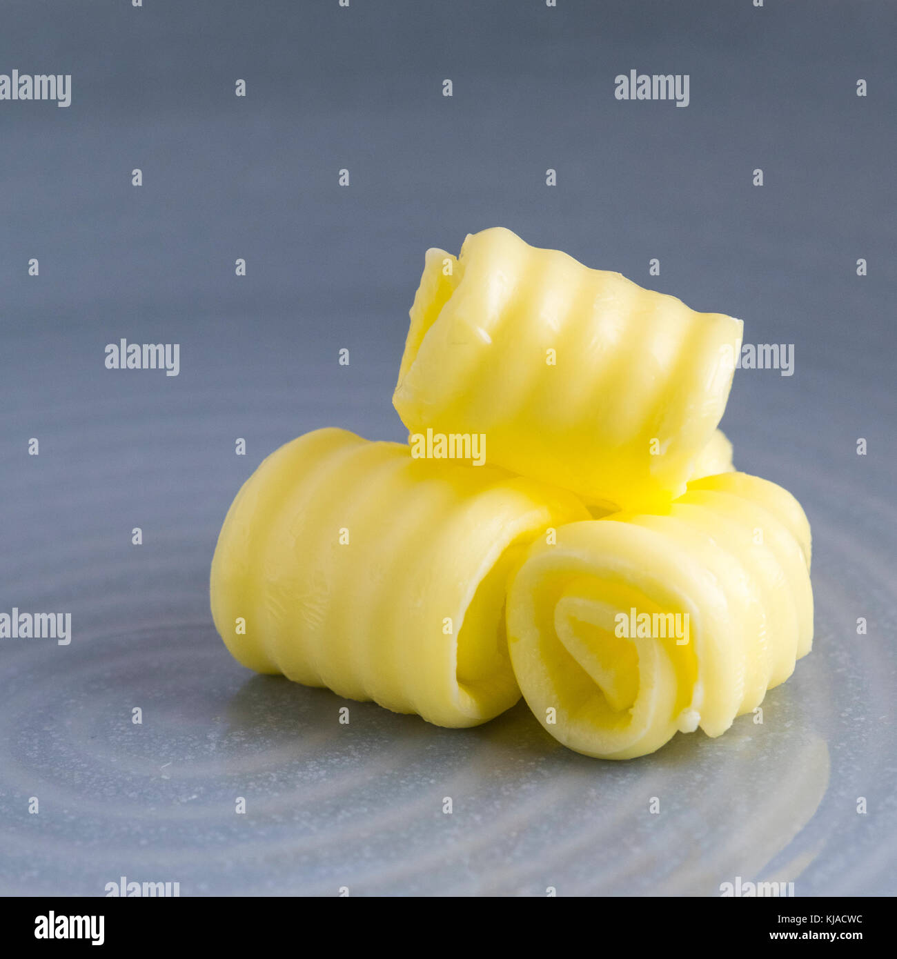 Curled butter hi-res stock photography and images - Alamy