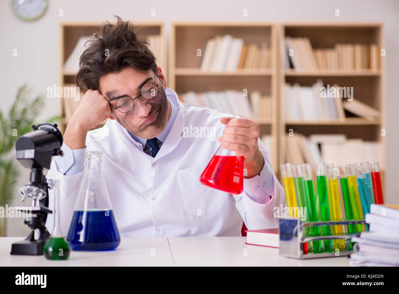 Mad crazy scientist doctor doing experiments in a laboratory Stock ...