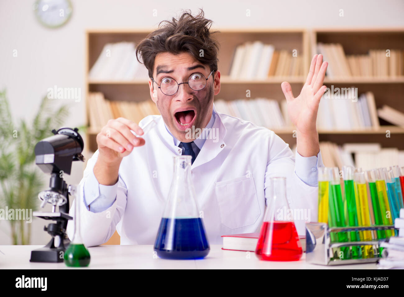 Mad crazy scientist doctor doing experiments in a laboratory Stock ...