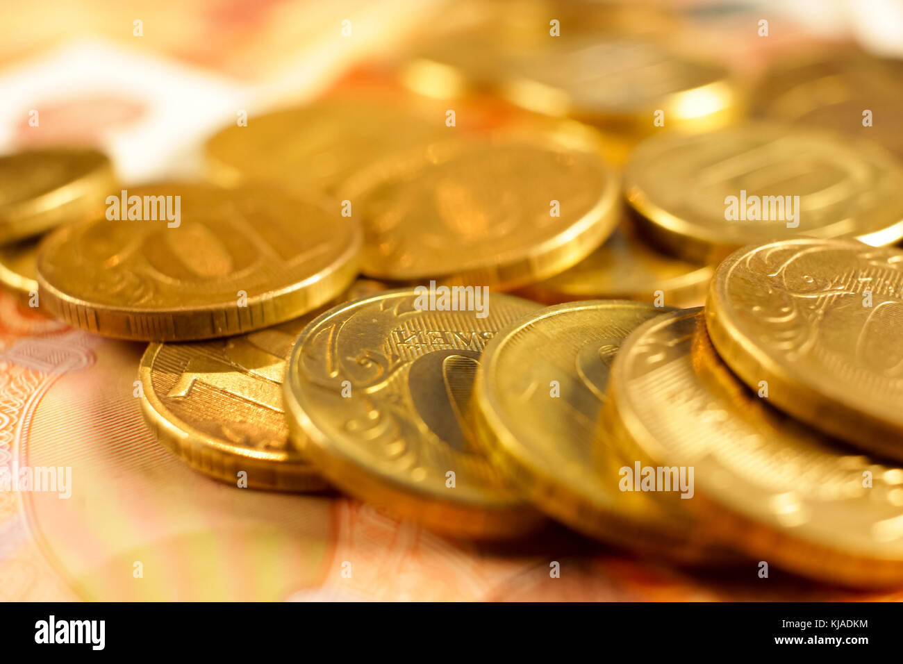 Set of russian ruble coins laying on russian banknotes. Russian ...