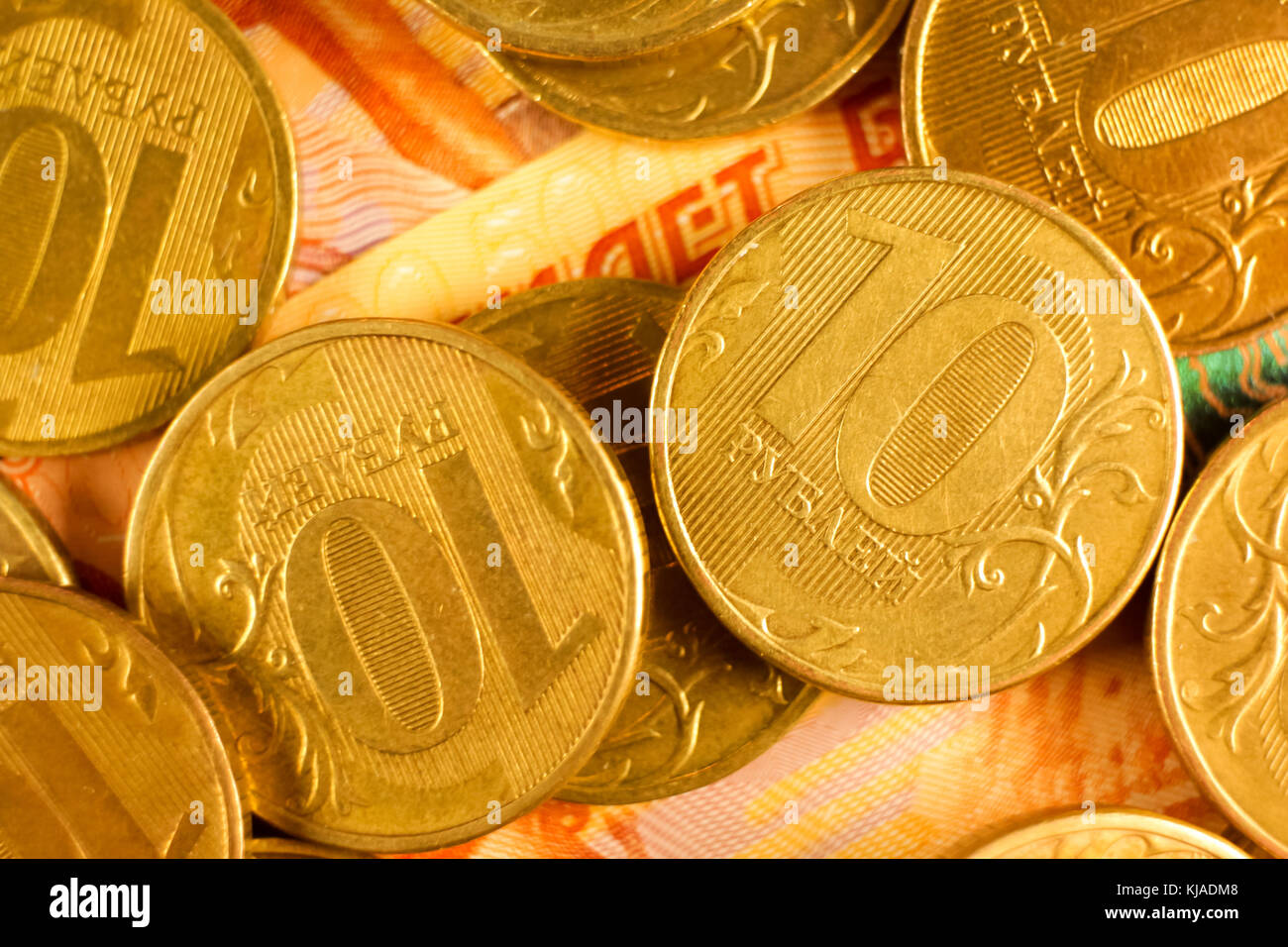 Set of russian ruble coins laying on russian banknotes. Russian ...